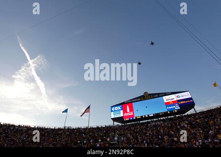 Military jets perform a flyover before the MLB All-Star baseball Home ...