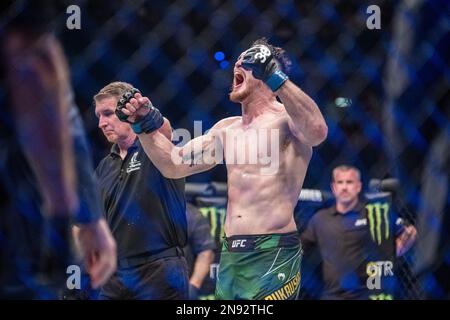 PERTH, AUSTRALIA - FEBRUARY 12: (R-L) Tyson Pedro kicks Modestas ...
