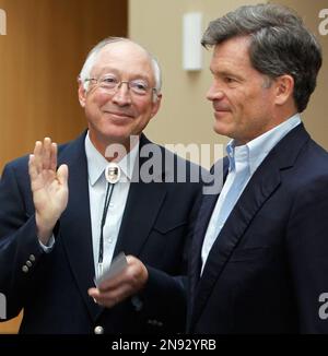 Billionaire hedge fund manager Louis Bacon uses a map to show his ranch ...