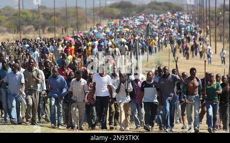 Miners march to Lonmin Platinum Mine near Rustenburg, South Africa ...