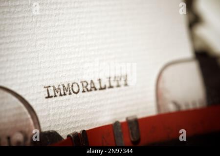 Immorality word written with a typewriter Stock Photo - Alamy