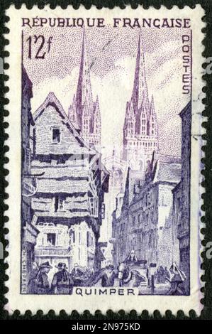 TIMBRE OBLITÉRÉ QUIMPER. RÉPUBLIQUE FRANÇAISE. POSTES. 12F Stock Photo ...