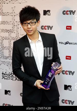 Chinese singer Hu Xia poses during a media event promoting his new ...