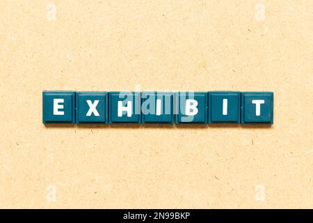 Tile alphabet letter with word exhibit in red color rack on wood ...