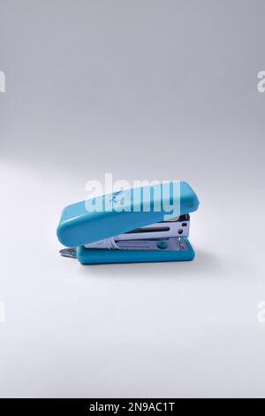 Closeup shot of a blue stapler on a white background Stock Photo - Alamy