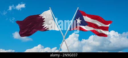 two crossed flags Puerto Rico and spain waving in wind at cloudy sky. Concept of relationship ...