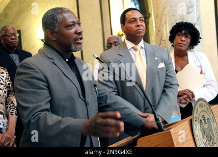 Sen. Kenneth Wayne Jones, D-Canton, laughs as Sen. Sean Tindell, R ...