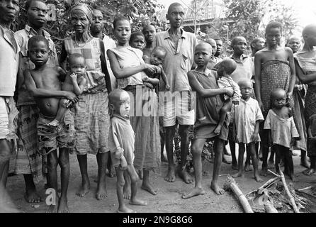 A group of starving Biafran children wait at Aba for doctors to see ...