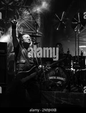 A vertical grayscale shot of Venom performing at the Brutal Assault ...
