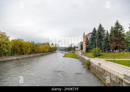 Terek river in Vladikavkaz. Urban landscape. Church and modern ...