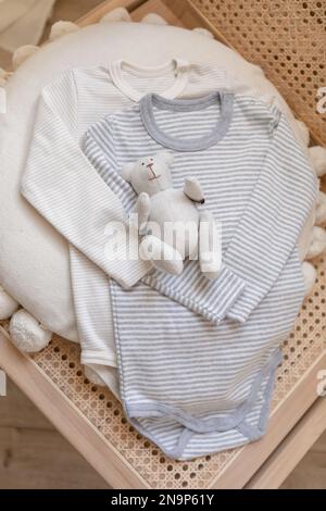 Newborn clothes composition Stock Photo - Alamy