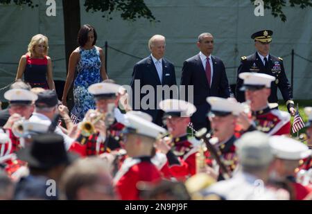 From left to right: Maj. Michael Tomlin, brigade operations officer ...
