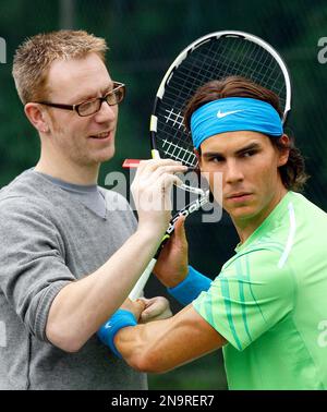 Roger Mackay, one of Madame Tussauds maintenance team puts finishing ...
