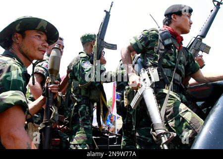 Democratic Karen Buddhist Army (DKBA) attend a ceremony to mark the ...