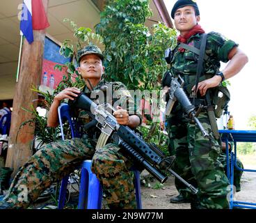 Democratic Karen Buddhist Army (DKBA) attend a ceremony to mark the ...