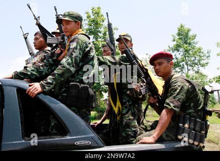 Democratic Karen Buddhist Army (DKBA) attend a ceremony to mark the ...