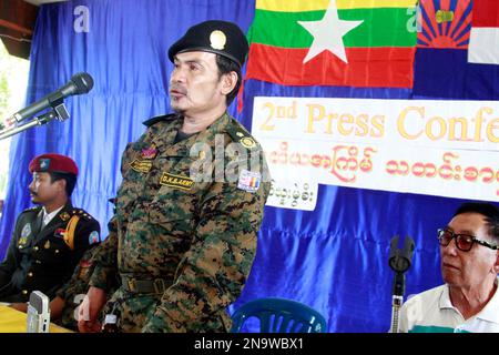 Democratic Karen Buddhist Army (DKBA) attend a ceremony to mark the ...