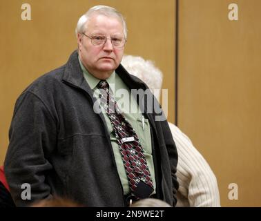 Chuck Cox, father of Susan Cox Powell, left, stands with his attorney ...