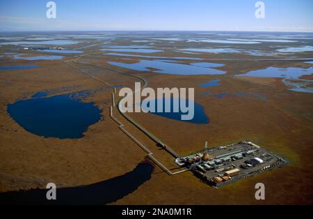 Aerial view of tundral rivers and an oil refinery, Northern Alaska ...
