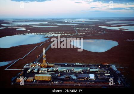 Aerial view of tundral rivers and an oil refinery, Northern Alaska ...