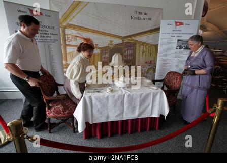 A mock up of a first class dinning table from the Titanic is seen in ...