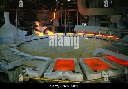 Molten copper is poured into molds at Chuquicamata Copper Refinery ...