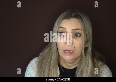 Scared girl portrait. Fear emotions. Afraid woman. Isolated Stock Photo ...