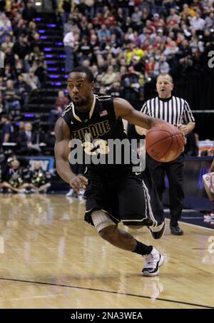 Purdue guard Lewis Jackson drives up court during the first half of an ...