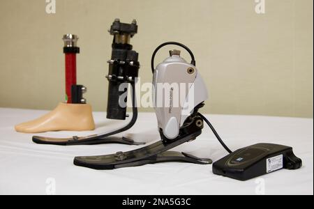From right, the microprocessor controlled ankle/foot prosthetic, shock ...