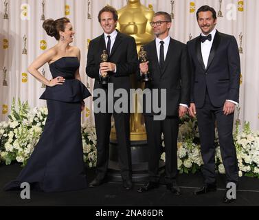 Kirk Baxter, second from left, and Angus Wall, second from right, pose ...