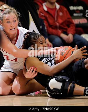 Stanford forward Joslyn Tinkle (44) loses the ball in front of Utah ...