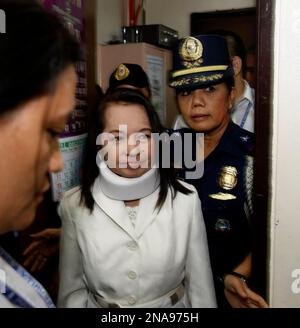 Former President and now Congresswoman Gloria Macapagal Arroyo smiles ...