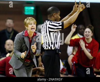Texas Tech head coach Kristy Curry pauses during post game news ...
