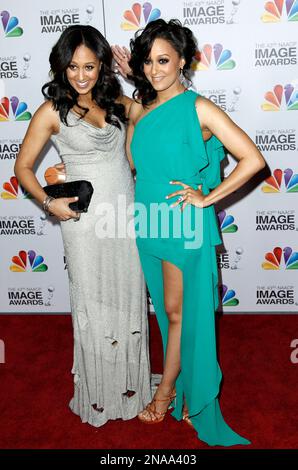 Tamera Mowry, left, and Tia Mowry arrive at the Essence 16th annual ...
