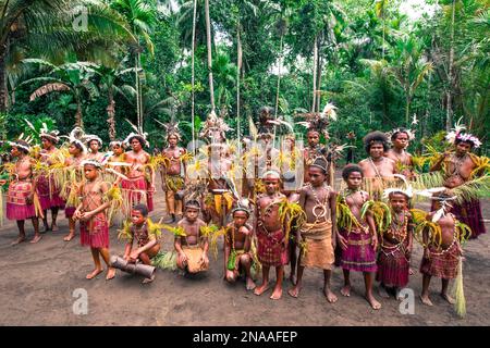 Villagers performing traditional sing sing Melanesian tribal dance in ...
