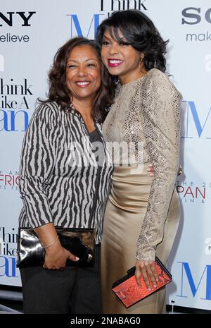 Taraji P. Henson poses right close to the unveiled star at the ceremony ...