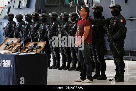 Jose Antonio Torres Marrufo, aka "Marrufo", is escorted by police ...
