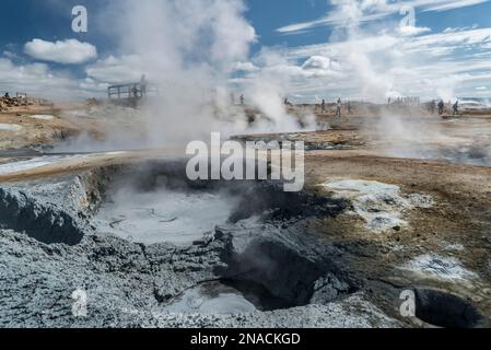 Visitors to Lake Myvatn, one of the most geologically active areas in ...