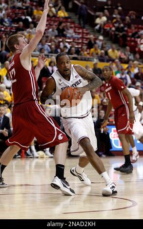 Arizona States' Kyle Cain, left, against Washington States' Brock Motum ...