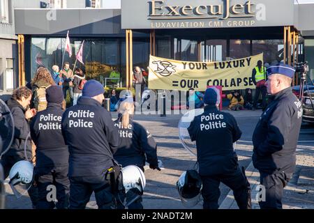 Police pictured at an action of climate activists Extinction Rebellion ...