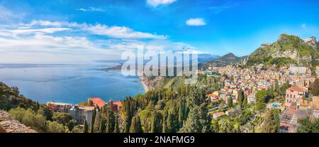 Awesome view of Taormina resorts and Etna volcano mount. Giardini-Naxos ...