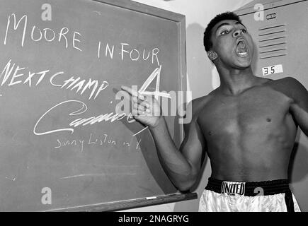 Heavyweight boxer Cassius Clay predicts the round his bout with Charley ...