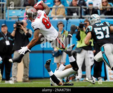 NFL football player Kellen Winslow, Jr. and his wife, Janelle arrive at ...