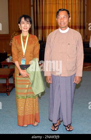 NAYPYITAW, Myanmar - Myanmar opposition leader Aung San Suu Kyi answers ...