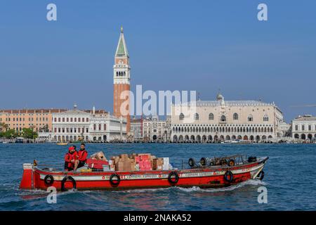 Delivery boat of the parcel service DPD on the Grand Canal in front of ...