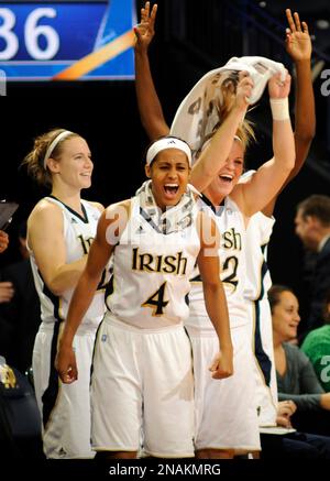 Notre Dame players Brittany Mallory (22) and Skylar Diggins (4 ...