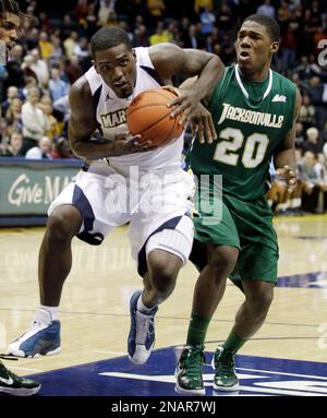 Marquette's Darius Johnson-Odom(1) drives to the basket against St ...