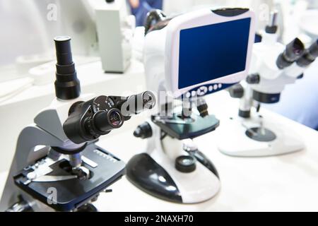 Research stereo microscopes with computers monitor Stock Photo - Alamy