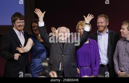John Higgins and his family (left-right) wife Denise, daughter Claudia ...
