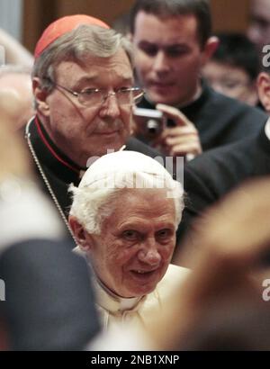Pope Benedict XVI, followed by Australian Cardinal George Pell, arrives ...